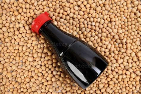 Soya Sauce In Glass Bottle On Bed Of Soyabean Background 24512054 Stock