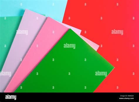 Colorful Notebooks On Blue And Red Background Stock Photo Alamy
