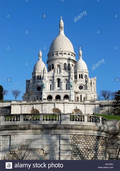 La Basilique du Sacré Coeur de Montmartre on a clear morning under a blue sky Stock Photo Alamy