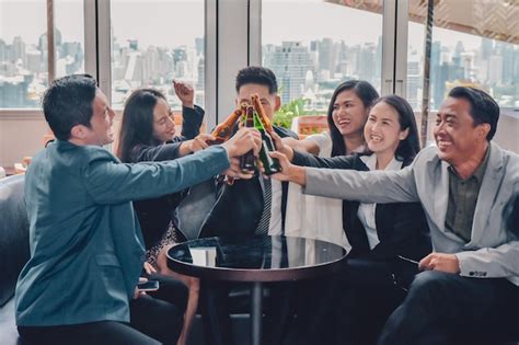 Premium Photo Asian People Group Drinking In Party Congratulation