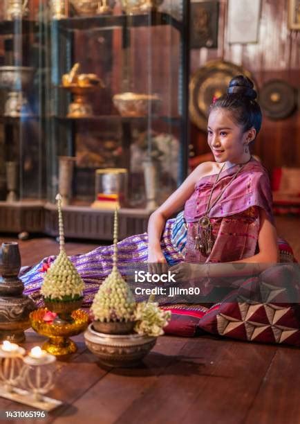 Portrait Photo Of A Young Beautiful Asian Laos Lady Wearing Traditional