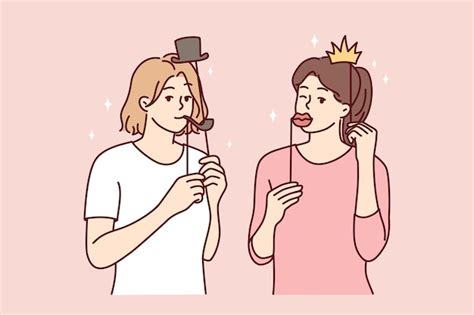 하우스 파티 또는 휴일 카니발 벡터 이미지 동안 사진 촬영을 위해 재미있는 마스크를 쓴 여자 친구 프리미엄 벡터