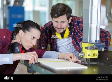 Engineer Training Female Apprentice On Milling Machine Stock Photo Alamy