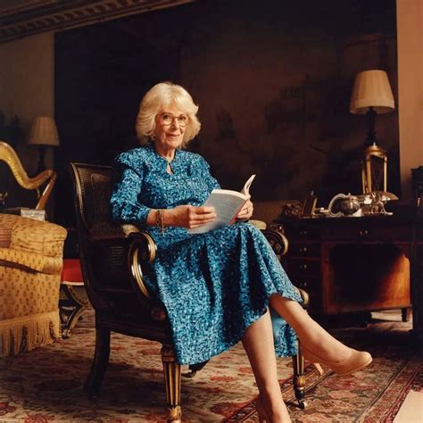 Download Queen Camilla Posing With Glasses Wallpaper
