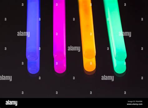 Colorful Fluorescent Light Neon Glow Stick On Mirror Reflection Black