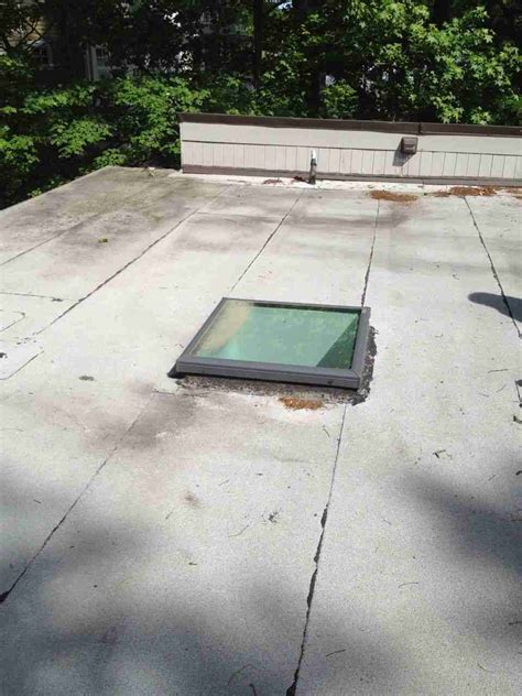 Leaking Flat Roof When To Repair Or Replace Lyons Contracting