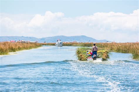 People On The Floating Uros Islands On Lake Titicaca In Peru Editorial