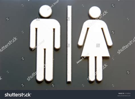 Unisex Symbols On A Door Sign Even The Gray Color Gives No Hint Of