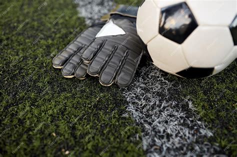 Premium Photo Sport Soccer And Game Ball And Goalkeeper Gloves On