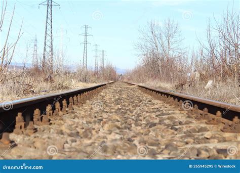 Ground Level Shot Of The Rails Of A Train In A Desolated Area Stock