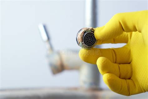 Replacing The Old Aerator With A New One Stock Image Image Of Gloves Faucet 169007811