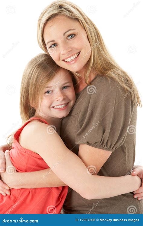 Mother Hugging Her Daughter Of Happy Love Concept In Nature Background