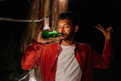 Premium Photo Indian Man Drinking Beer Nonstop Drinking A Lot Of Beer