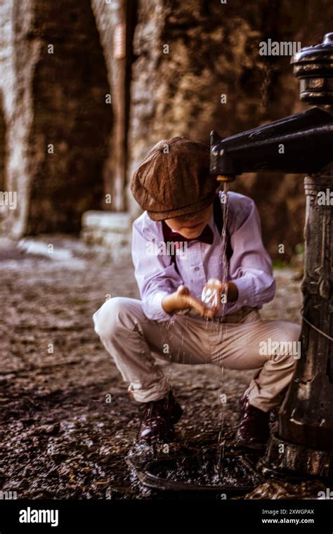 Outdoor Retro Photography Of A Boy In The Old Town Stock Photo Alamy