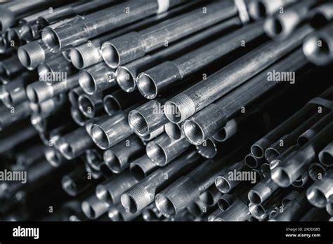 Metal Gas Pipe Store Stack Pile On Shelf Black And White Vintage Color