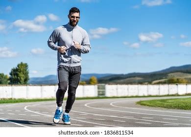 Male Athlete Running Track Front View Over Royalty Free Licensable Stock Photos Shutterstock