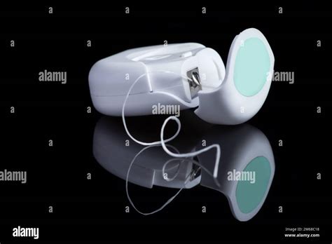 Container With Dental Floss Floss On Black Background White Dental