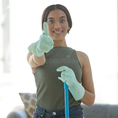 Thumbs Up Portrait And Happy Woman Maid Cleaning The Living Room Of A