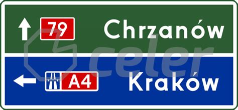 E e Znak kierunku miejscowości drogowy pionowy drogowskaz tablicowy umieszczany obok jezdni