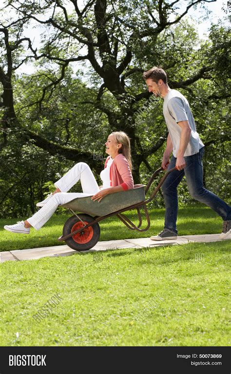 Man Pushing Woman Image Photo Free Trial Bigstock