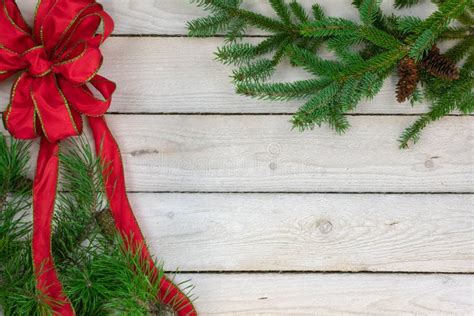 Holiday Border Of Greenery In The Upper Right And Lower Left Cor Stock