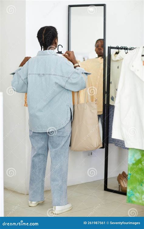 Woman Trying On Clothes By Mirror Stock Image Image Of Fashion