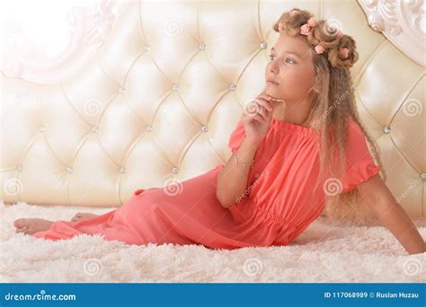 Adorable Girl In Beautiful Pink Dress With Stylish Hairstyle Pos Stock