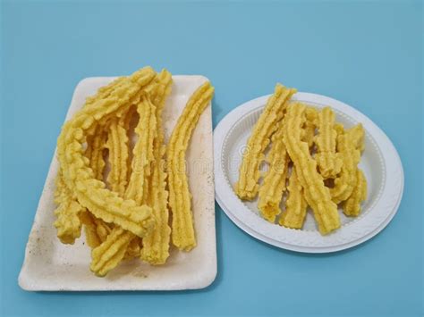Crispy Yellow Crackers With A Savory Taste Can Be Eaten As A Snack Or