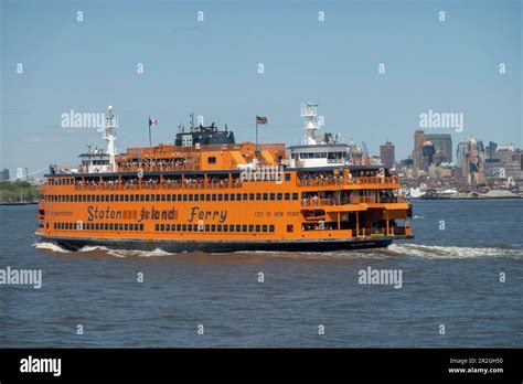 The Staten Island Ferry Crosses The New York Harbor From Staten Island