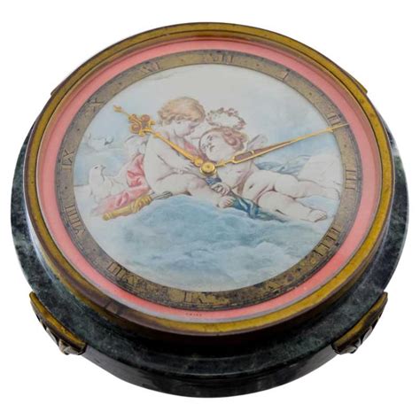 Dunhill Stone And Metal Art Deco Zodiacal Clock With An Enamel Dial