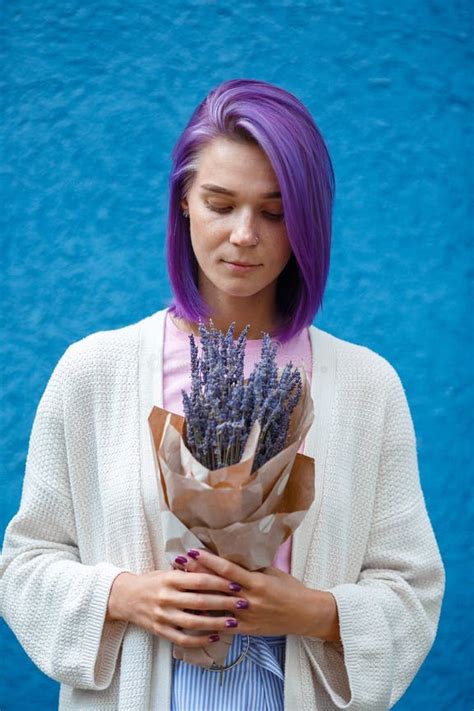 Girl With Colourfull Purple Hair Holding A Lavender Bouquet In Her