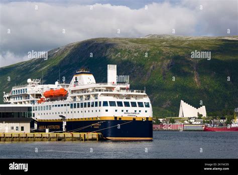 Ships In A Harbor In Tromso Modern Architecture Arctic Cathedral In