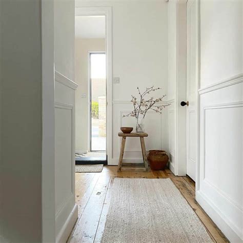 White Themed Hallway With Earthy Accents Soul And Lane