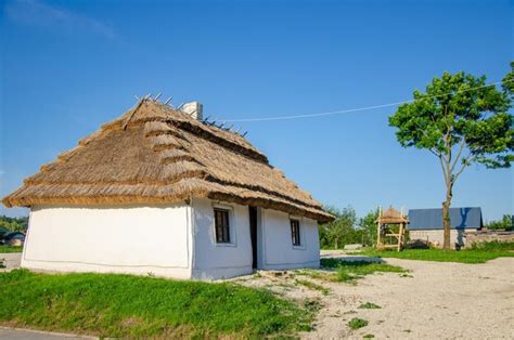 Premium Photo Rural Landscape With An Ancient Ukrainian Clay House