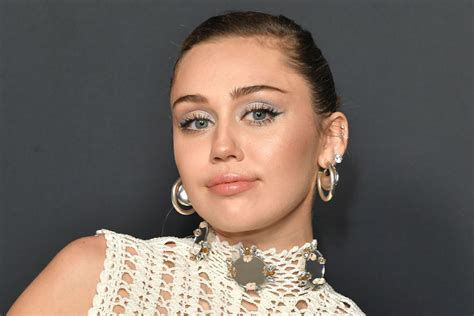Miley Cyrus Poolside Bikini Outfit Includes A Surprising Choice In