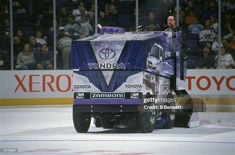 A Driver Rides A Zamboni Ice Resurfacer Advertising The Toyota Tundra