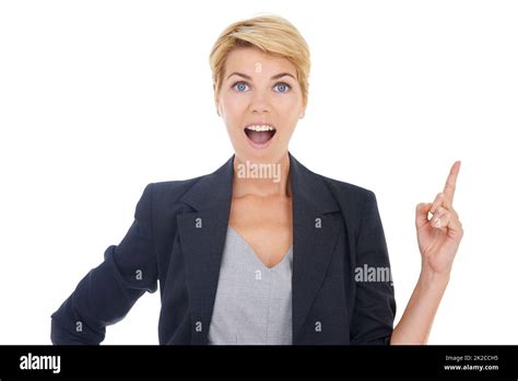 Pointing Up In Shock Portrait Of A Young Businesswoman Pointing