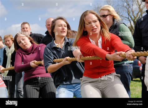 A Female Tug O War Team At An Annual Country Event Between The Villages Of Ashley And Medbourne