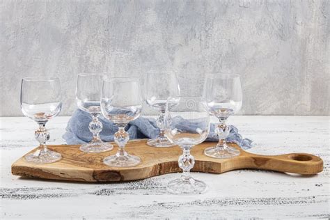 Six Crystal Goblet Set Of Six Empty Wine Glasses On White Wooden