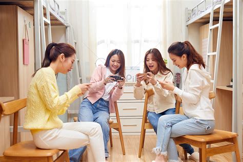 Female Student Dormitory Playing Mobile Games Together Picture And HD