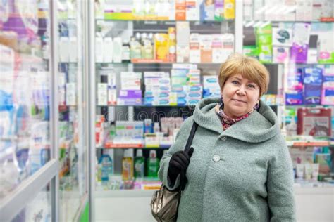 55 Year Old Woman Buys Cold Medicine In Spring Day Stock Image Image