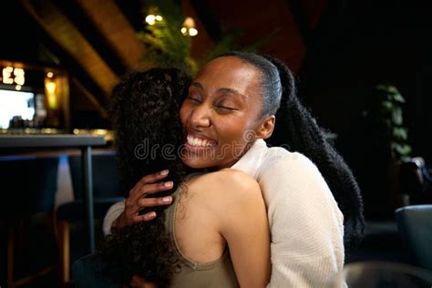 A African Woman Hugging Her Caucasian Best Friend Stock Image Image