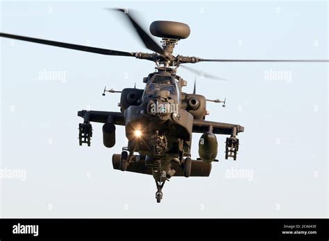 Army Air Corps Apache Attack Helicopter In The Hover Over Wattisham Airfield Suffolk Stock