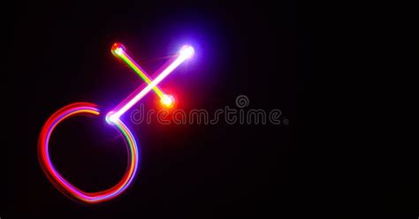 Long Exposure Photography Light Painting Photography Sex Symbol In Rainbow Color Stock Photo