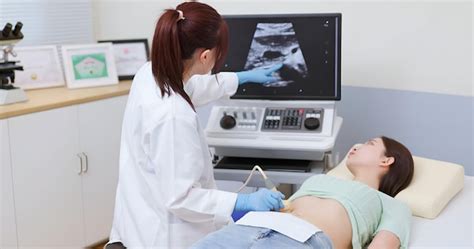 Premium Photo Woman Belly Ultrasound Examination