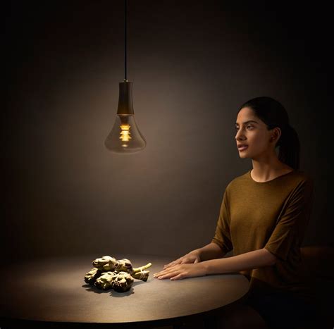 Plumen Designs Bulb With Faceted Gold Shade On The Inside