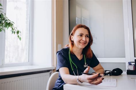 Premium Photo Happy Mature Middle Aged Woman Doctor Medical Nurse Portrait
