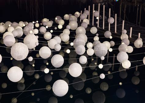 Sensual Wave Installation Illuminates An Empty Dock At French Harbour