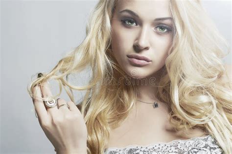 Close Up Fashion Portrait Of Beautiful Womanflirt Blond Girl With