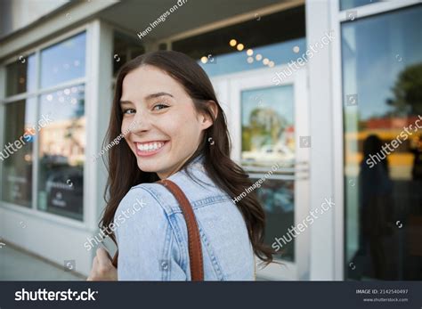 Beautiful Woman Looks Over Shoulder Over 27869 Royalty Free